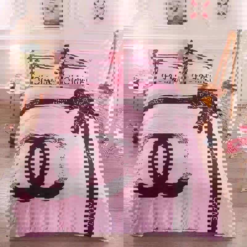 chanel logo with ribbon in pink background bedding set